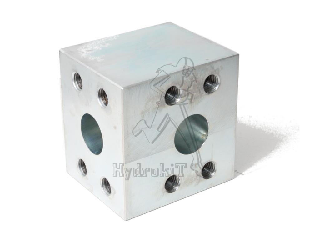 "Bloc hydraulique en T 1""1/4 SAE 6000 psi sans gorge"